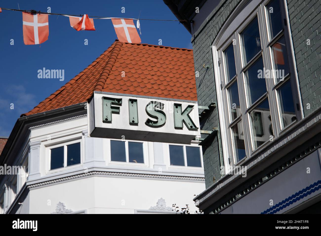 sign of the danish word fisk (means fish) on a building of a fish shop ...