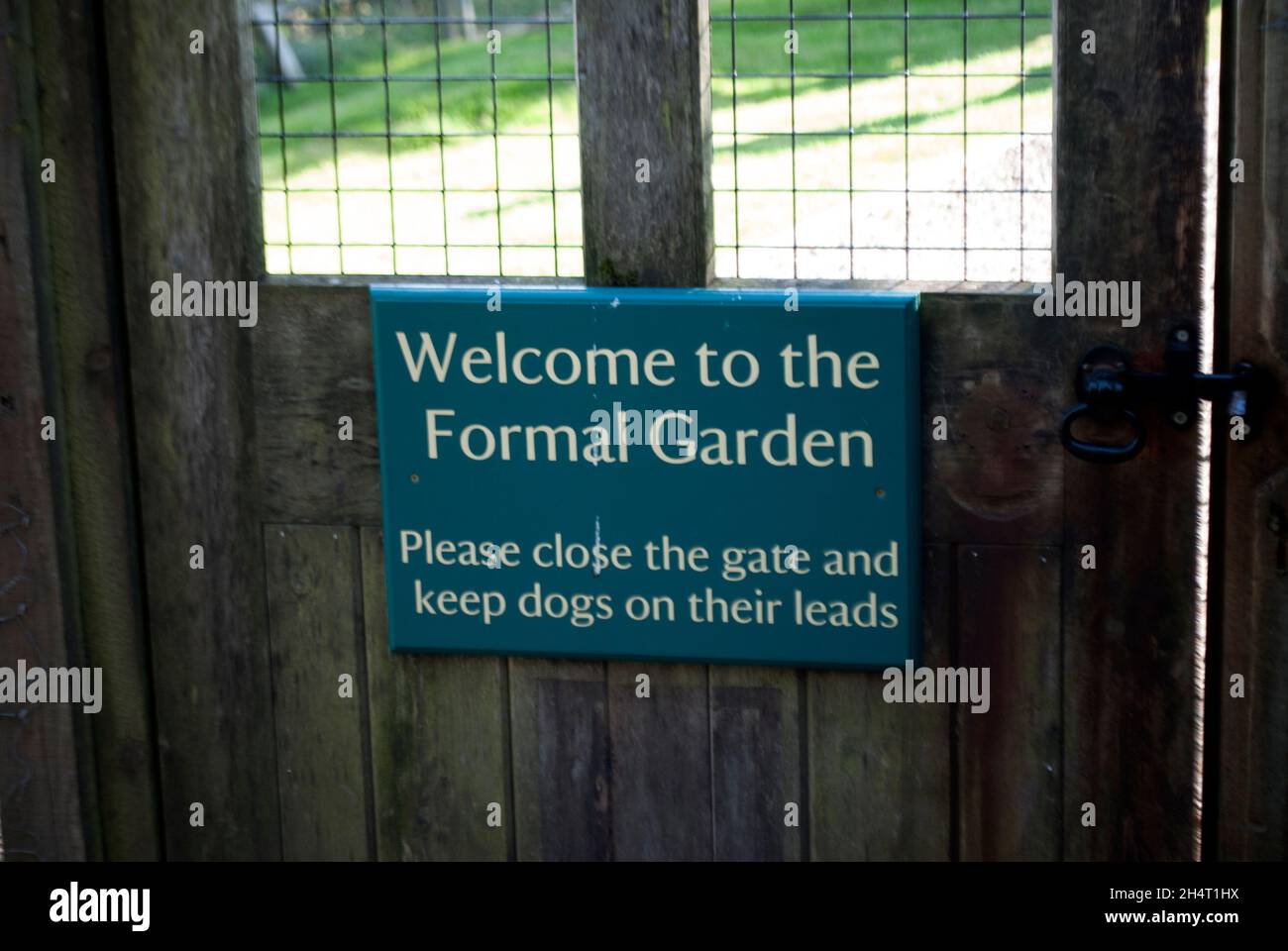 Gate at entrance to with 'Welcome to Formal Garden' sign to Formal ...
