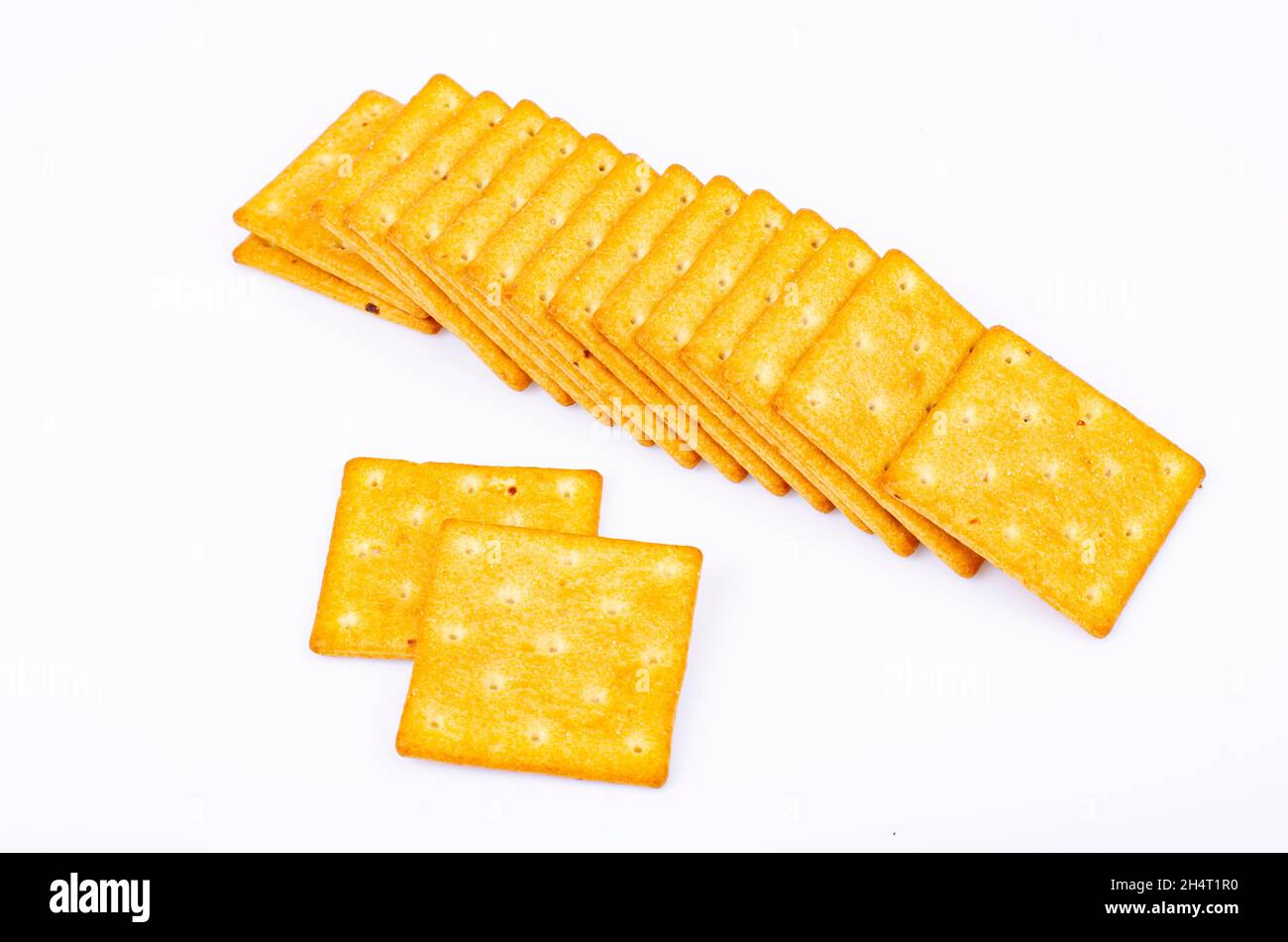 Delicious salty golden biscuit cracker square shape. Studio Photo Stock ...