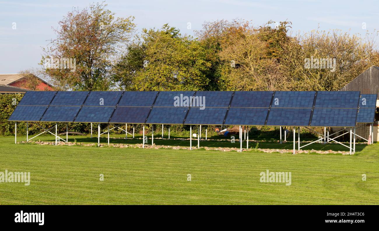 solar collector in a garden for ecological power generation Stock Photo ...