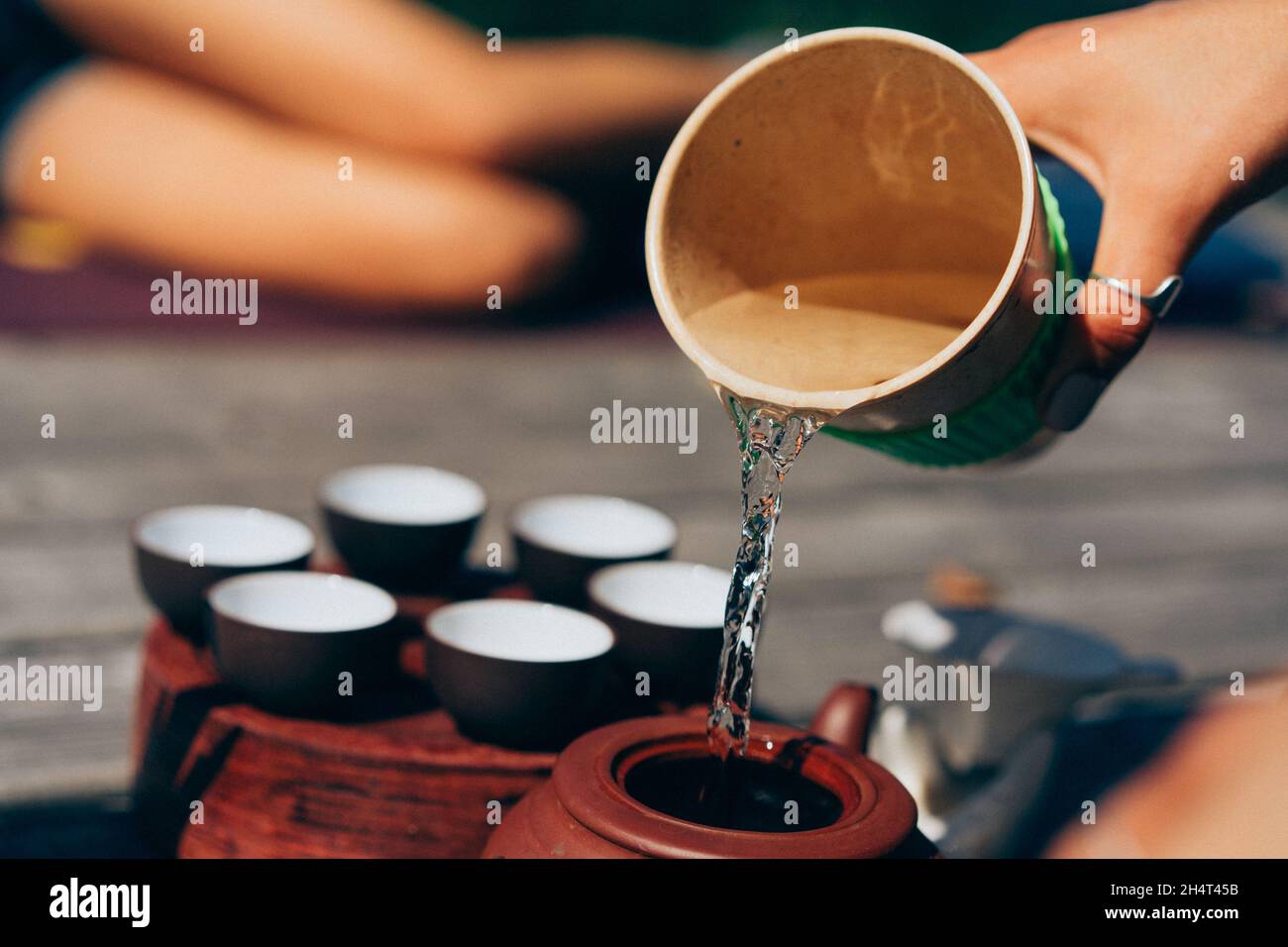 Tea ceremony, Woman pouring traditionally prepared tea Stock Photo - Alamy