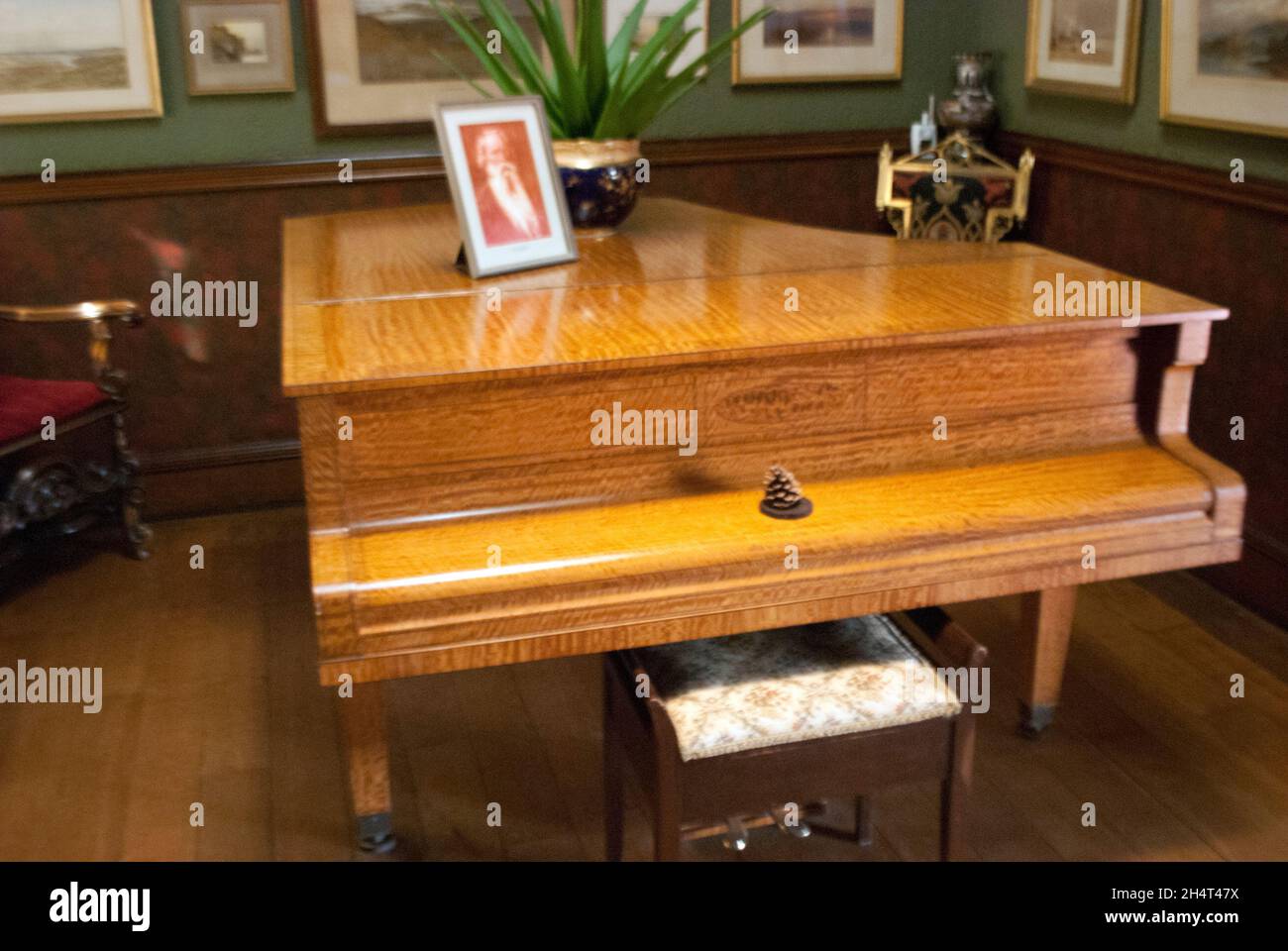Piano in drawing room Cragside, Rothbury, Northumberland, England, UK ...