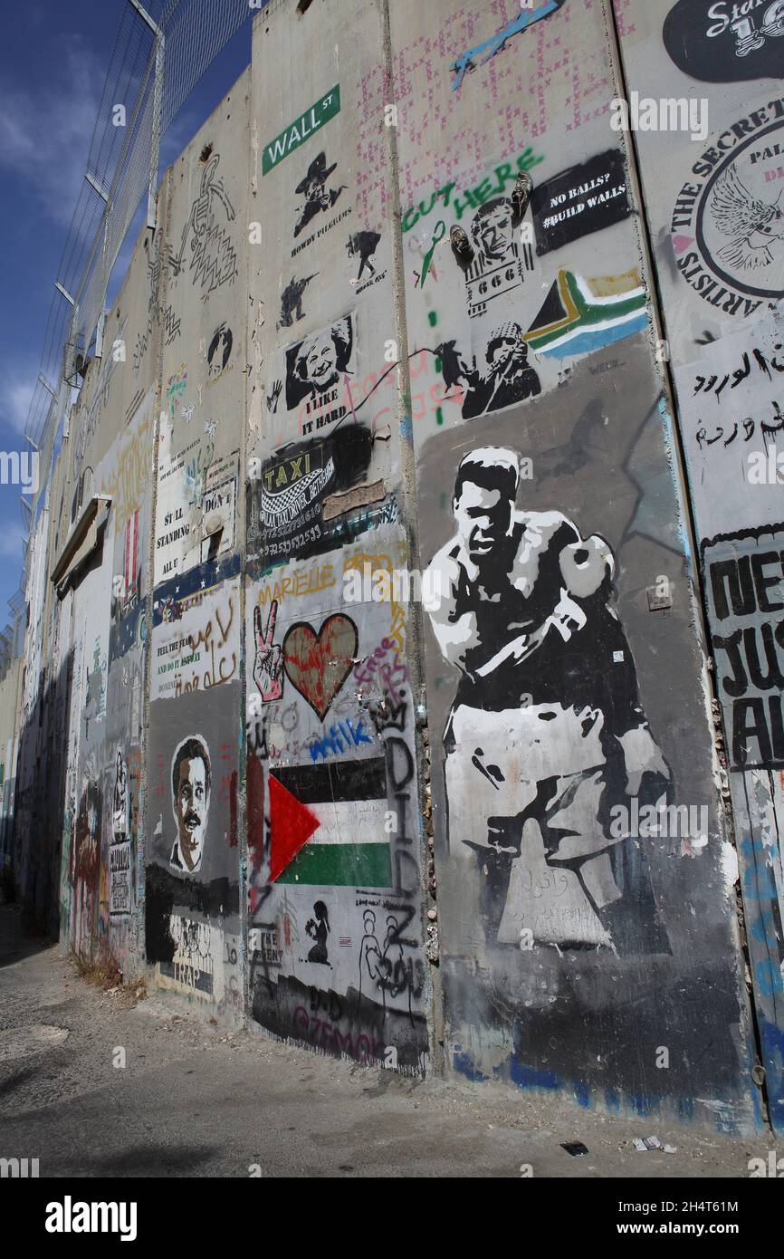 Muhamad Ali in graffiti painted on the Palestinian side of the Wall of ...