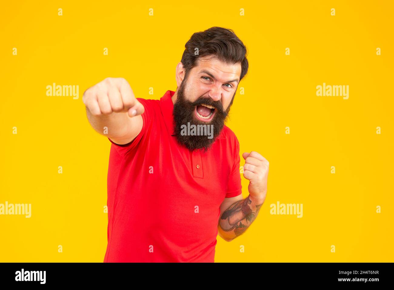 hair and beard care. angry man punching. mature hipster with beard ...