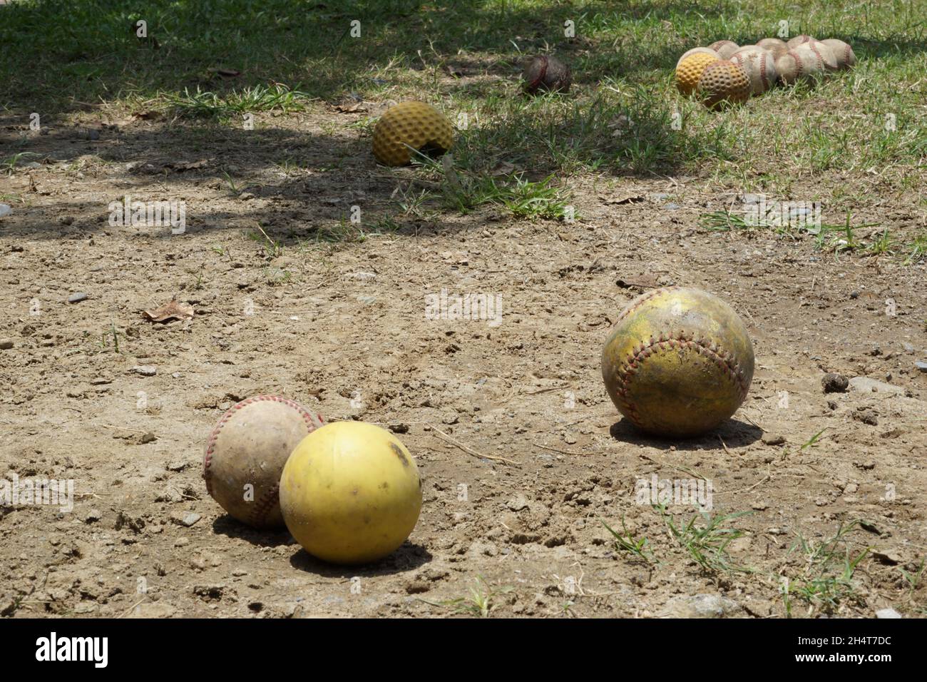 Softball on a grassy field Stock Photo - Alamy