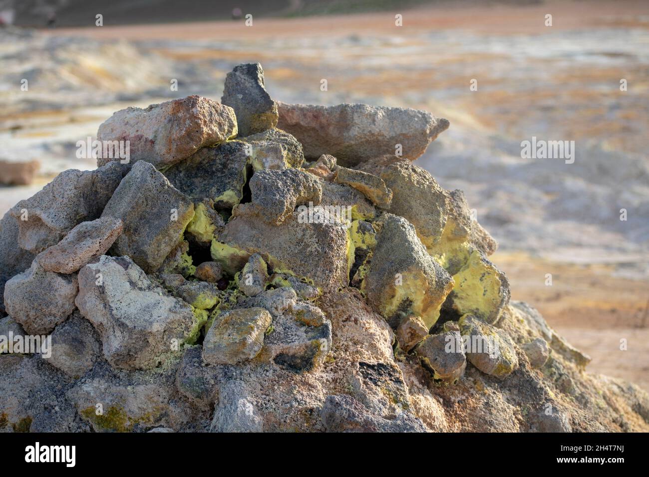 Landscape of sulfur covered rocks at Mt. Námafjall Fumaroles boiling ...