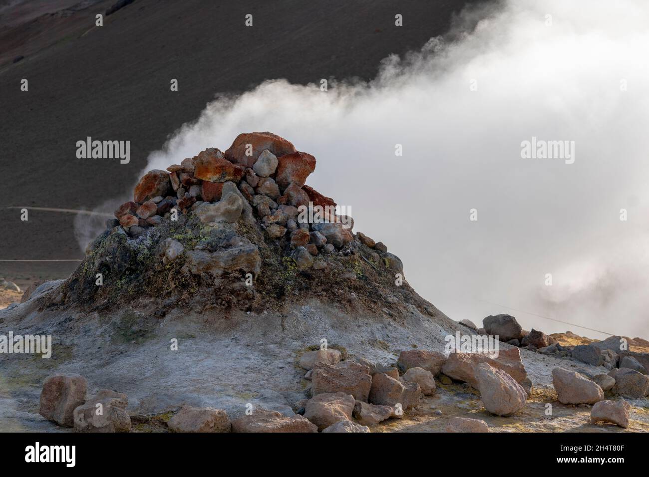 Landscape of steaming rocks at Mt. Námafjall Fumaroles boiling mud pit ...