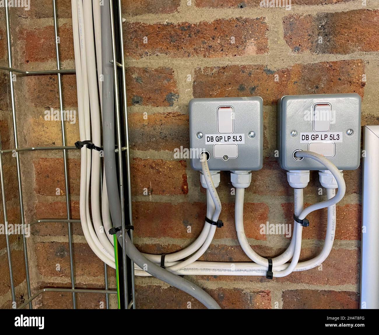 Closeup shot of electric power switch points in a brick wall Stock ...