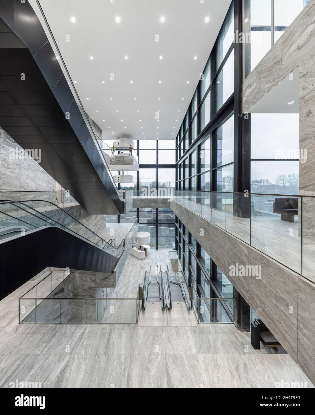 Interior atrium view with escalators. Courthouse Amsterdam, Amsterdam ...