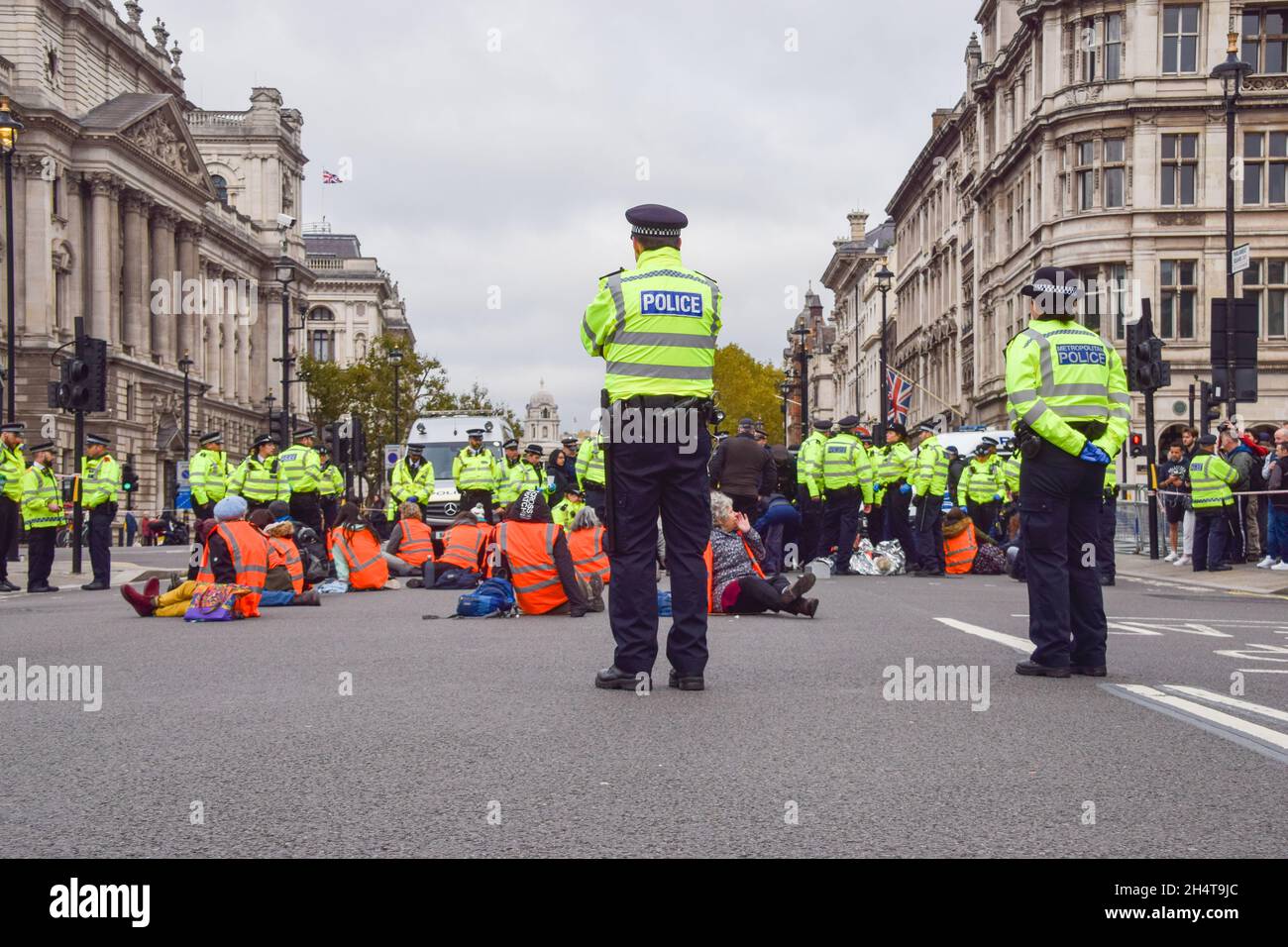 London, UK. 04th Nov, 2021. Police officers observe the protesters ...