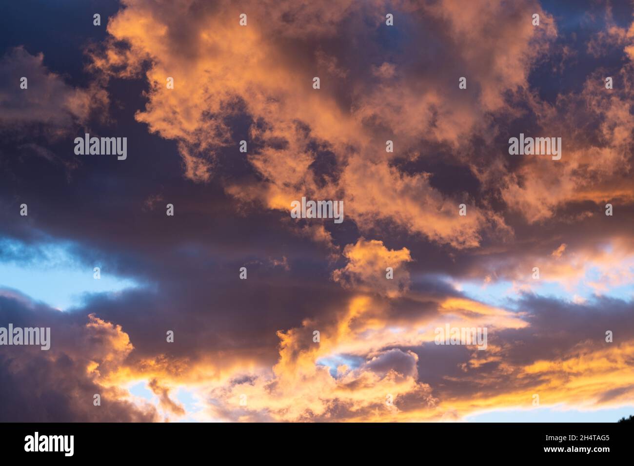 Fiery orange sunset sky. Beautiful sky. Cloudy sunset. Orange clouds ...