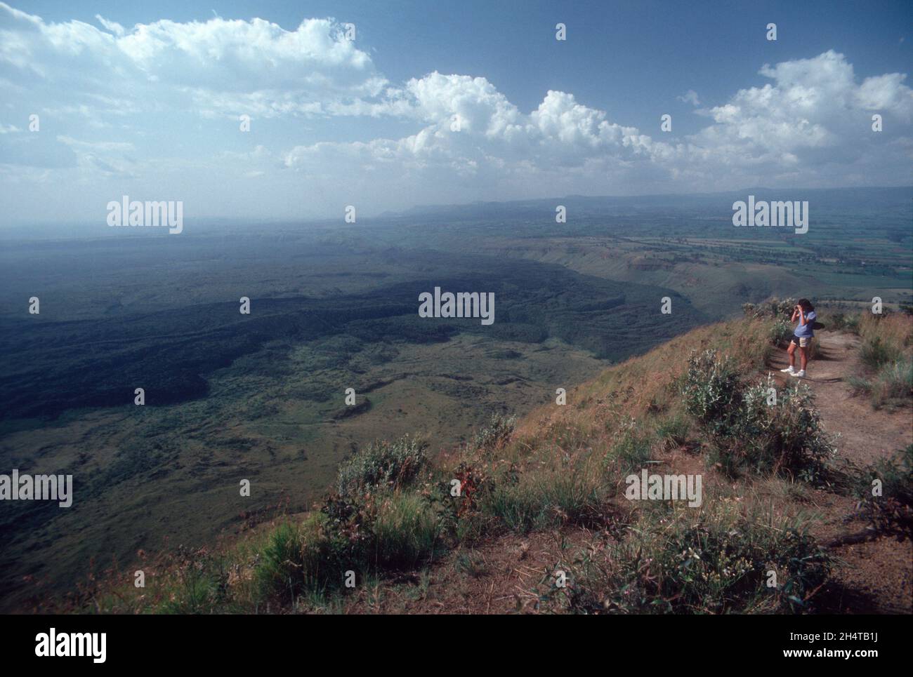 Tourist enjoying the views at the top of Menengai Crater, Kenya Stock ...