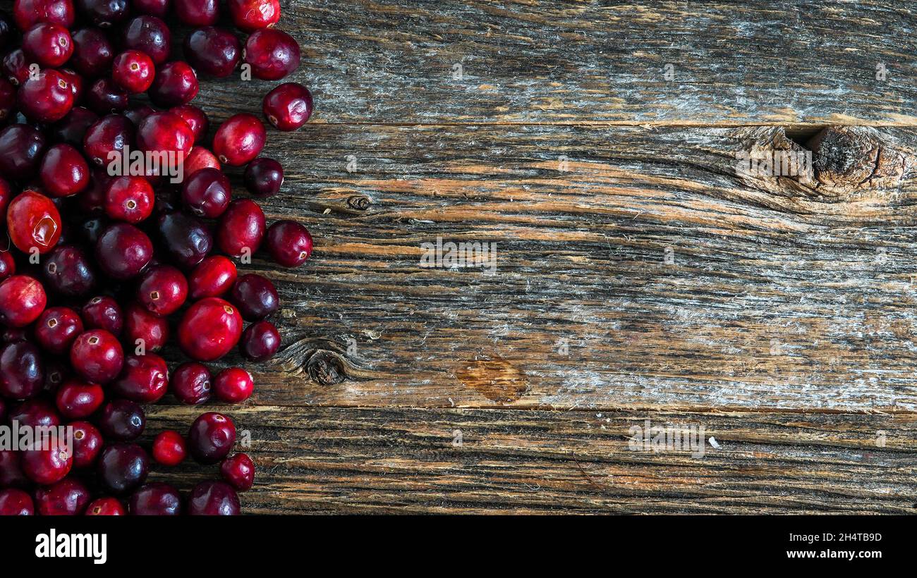Cranberry background on rustic wooden background with text space Stock ...
