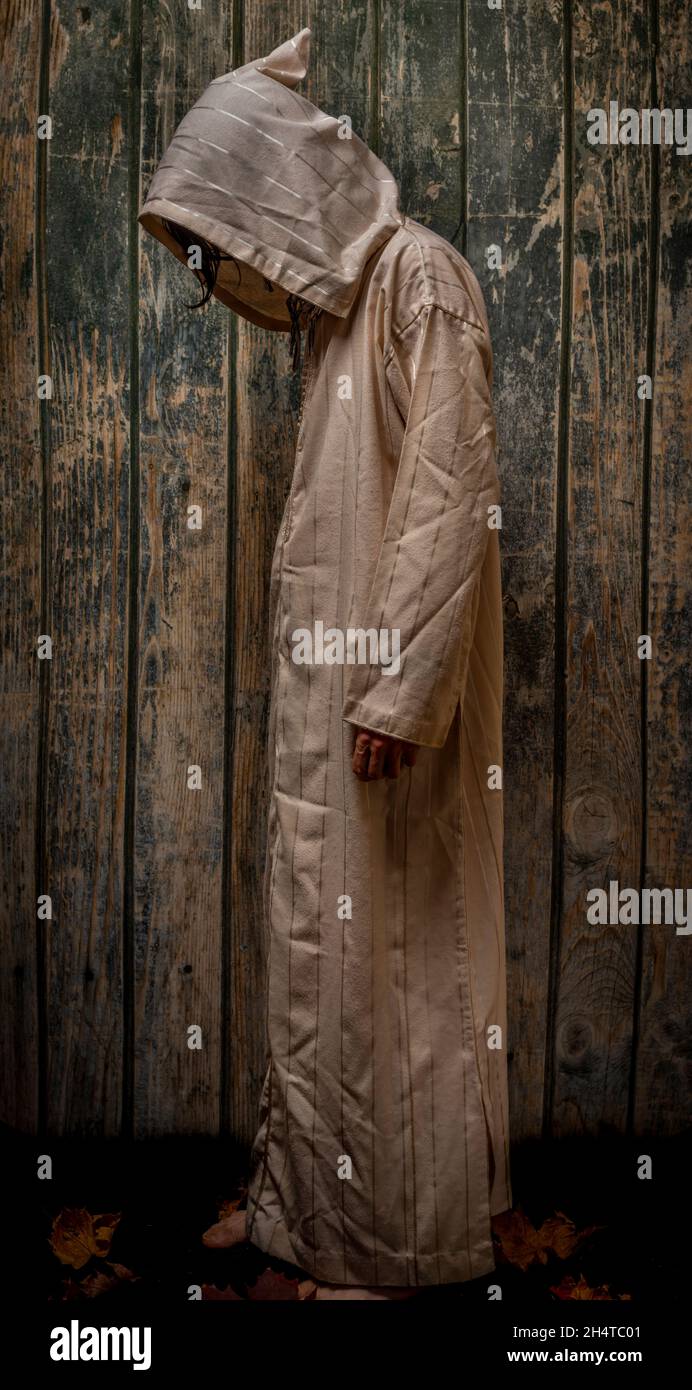 Tall man long priest hi-res stock photography and images - Alamy
