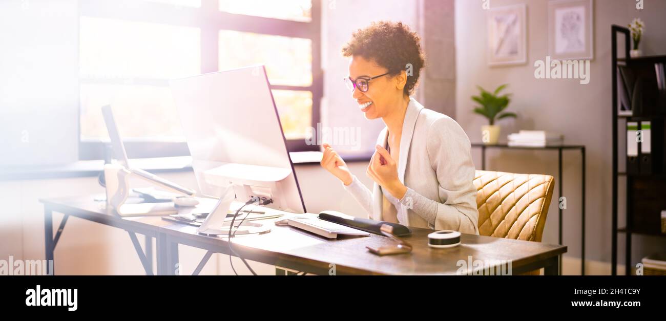 Happy Professional African American Women Using Computer Stock Photo ...