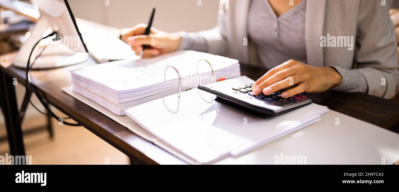 IRS Tax Audit. African American Female Auditor Doing Debt Fraud ...