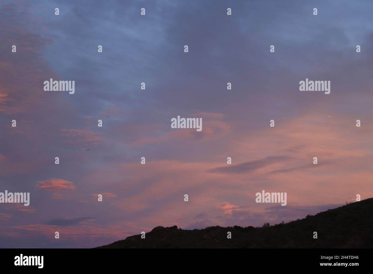 Dramatic sunset above the mountains and explosion of colors Stock Photo ...