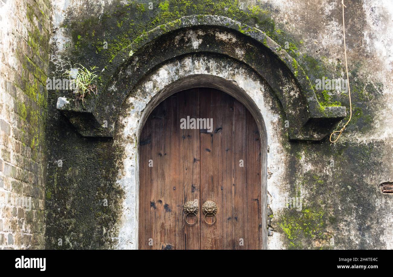 The arched doorway of the former Wu Sheng Temple in Xingping, China ...