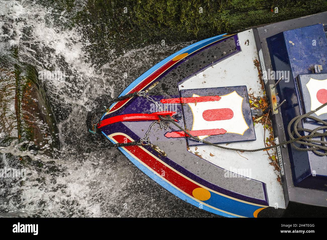 Top view of the front end of an isolated narrowboat inside a UK canal ...