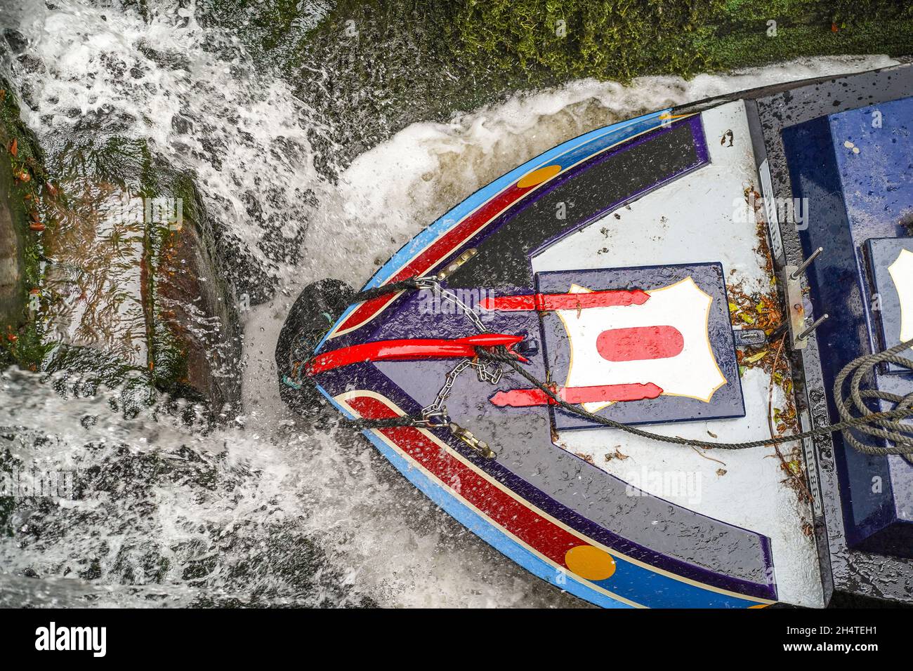 Top view of the front end of an isolated narrowboat inside a UK canal ...