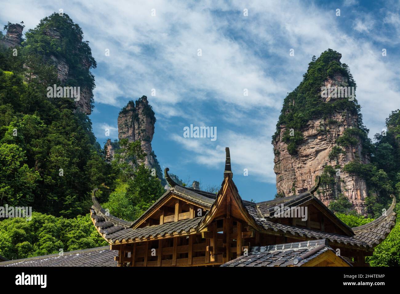 The upturned eaves of a traditional Chinese roof in a building in ...