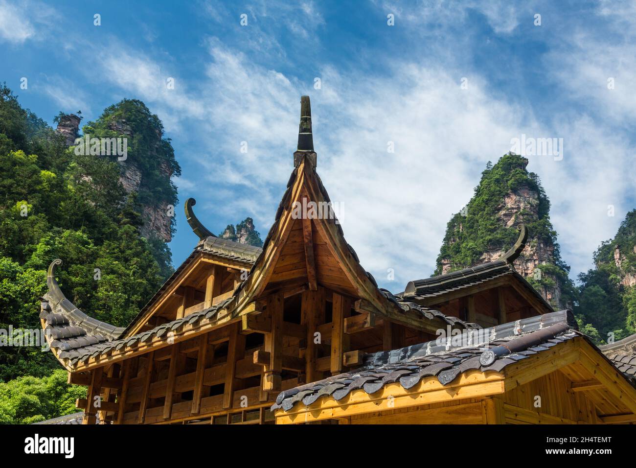 The upturned eaves of a traditional Chinese roof in a building in ...