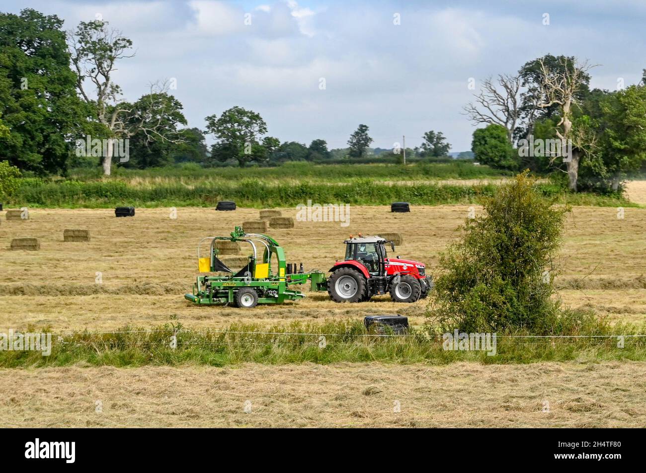 Swindon, England - August 2021: Trasctor towing farm machinery to ...