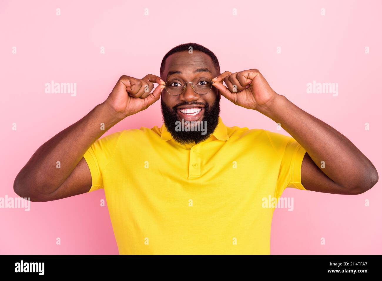 Portrait of attractive cheerful intellectual guy nerd wearing touching ...