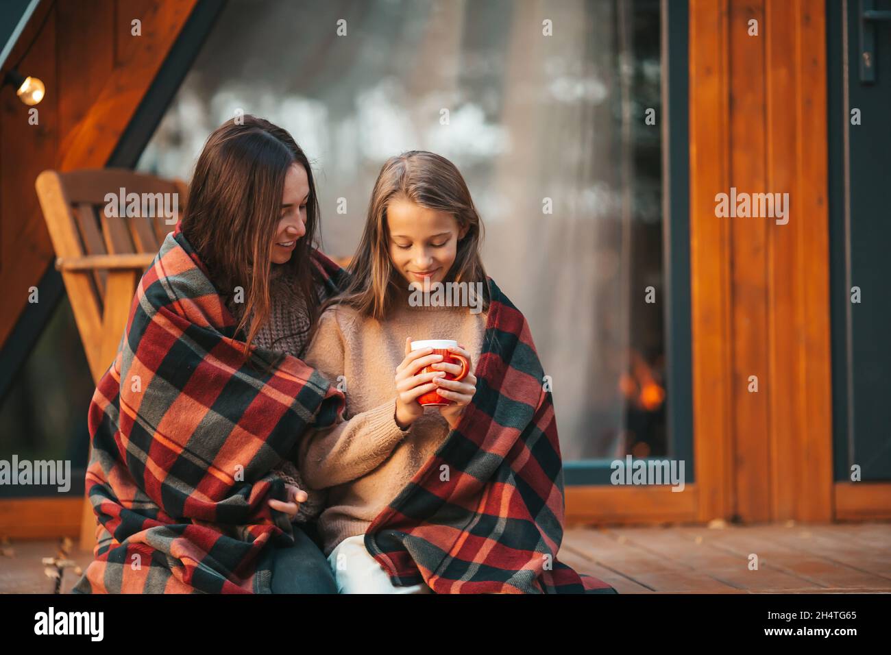 Beautiful family at autumn warm day together Stock Photo - Alamy