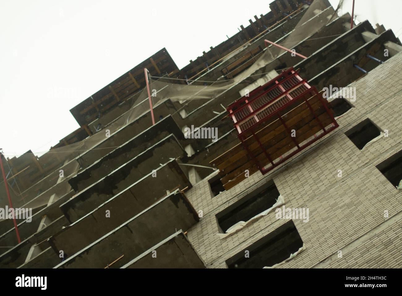 Building a house. Cladding of the building. Construction in the city ...