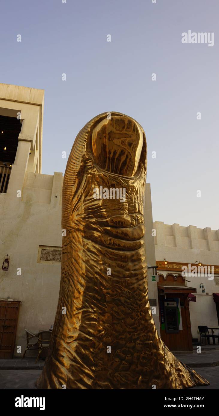 Thumb sculpture from Souq Waqif marketplace in Doha, Qatar Stock Photo ...