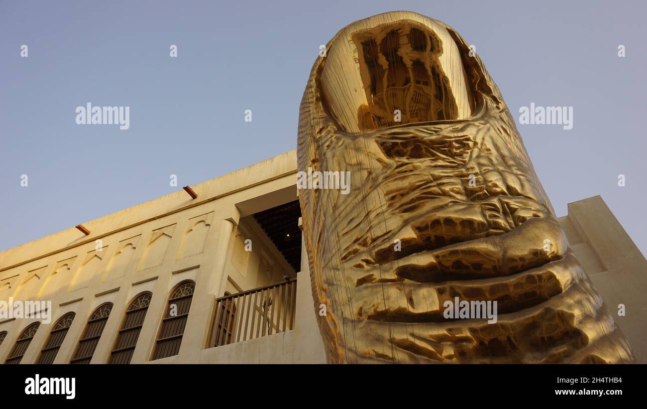 Thumb sculpture from Souq Waqif marketplace in Doha, Qatar Stock Photo ...