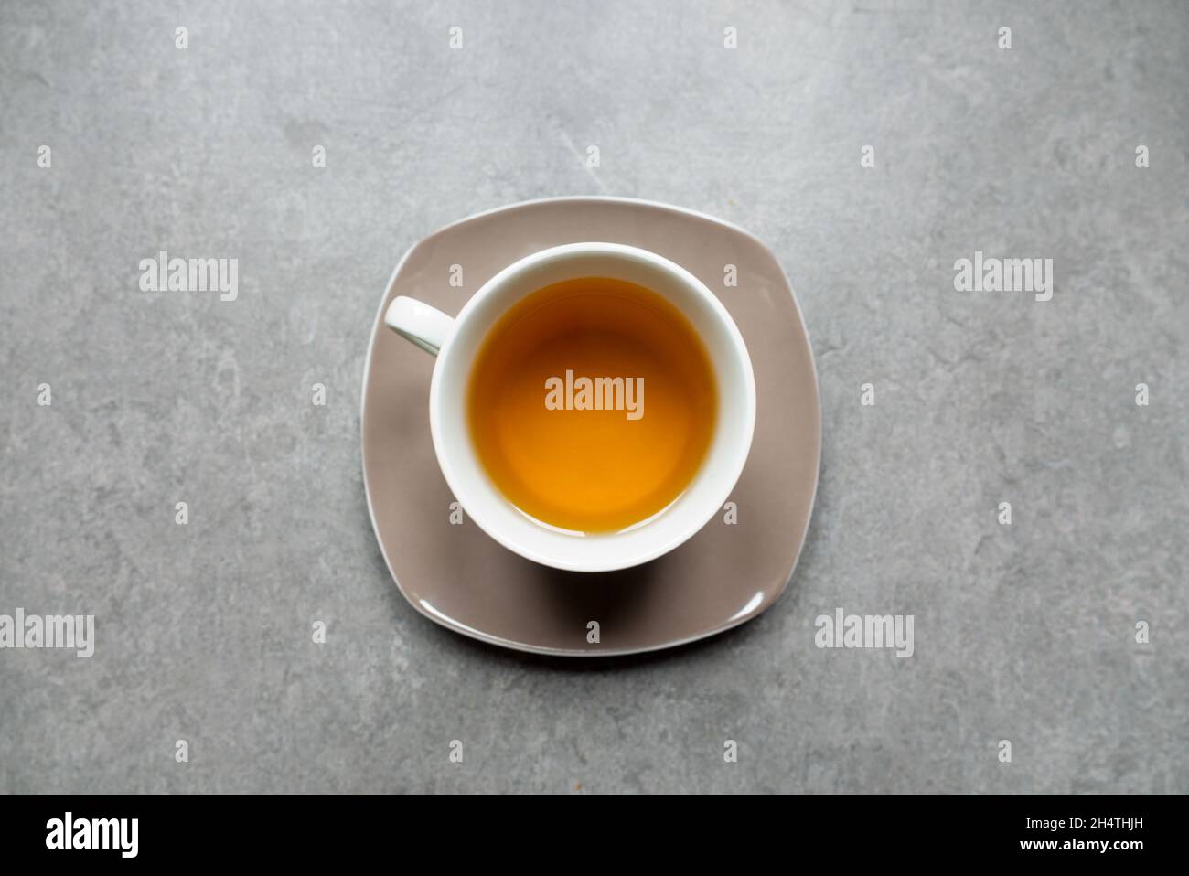 Beige ceramic cup saucer hi-res stock photography and images - Alamy