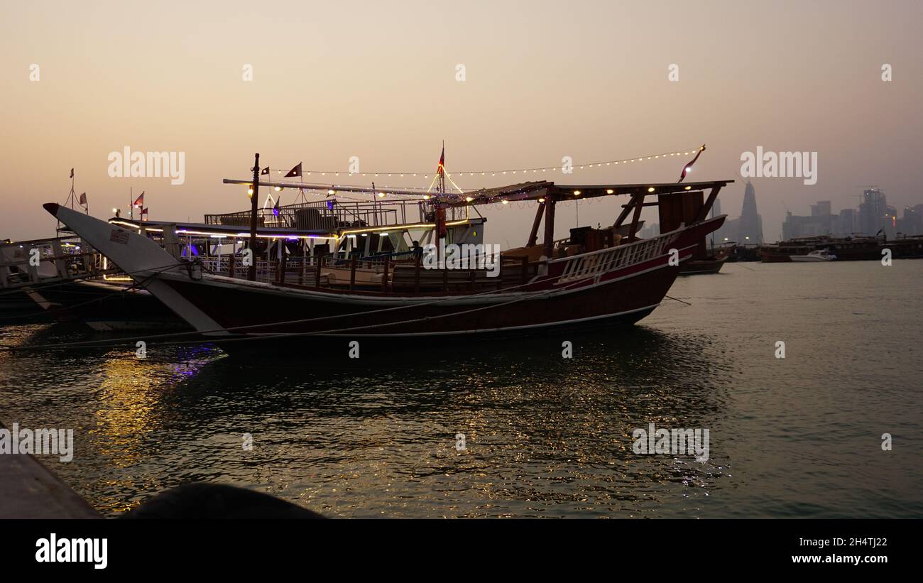 Boats with lights by Corniche, Qatar Stock Photo - Alamy