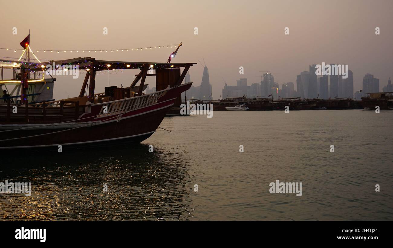 Boats with lights by Corniche, Qatar Stock Photo - Alamy