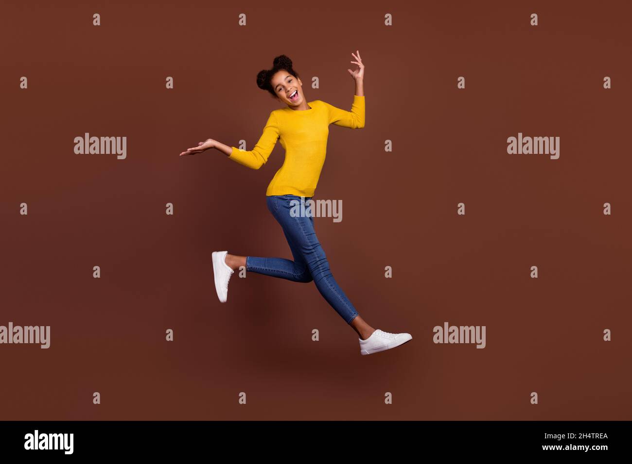 Full size profile photo of little girl jump wear shirt jeans shoes ...