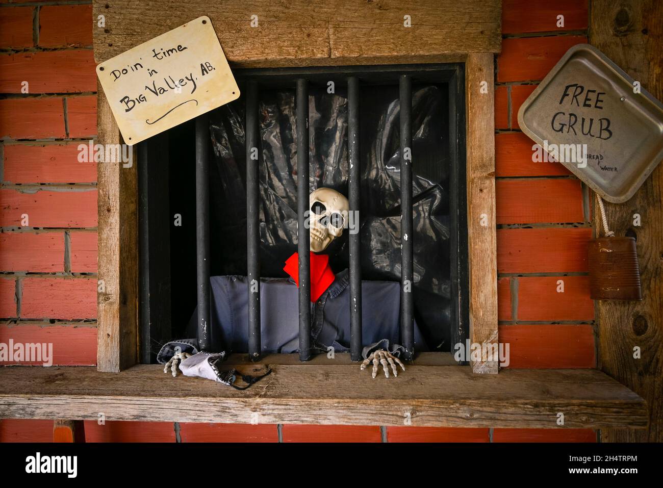 Skeleton in jail, Jimmy Jock Boardwalk, Big Valley, Alberta, Canada ...