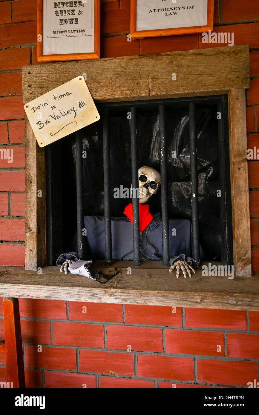 Skeleton in jail, Jimmy Jock Boardwalk, Big Valley, Alberta, Canada ...