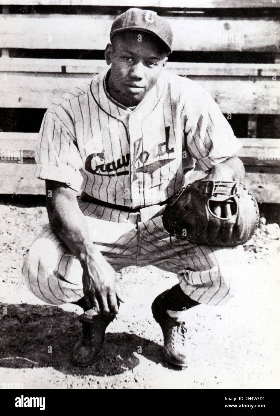 Josh Gibson with catcher glove in photo with the Pittsburgh Crawfords of the Negro National ...