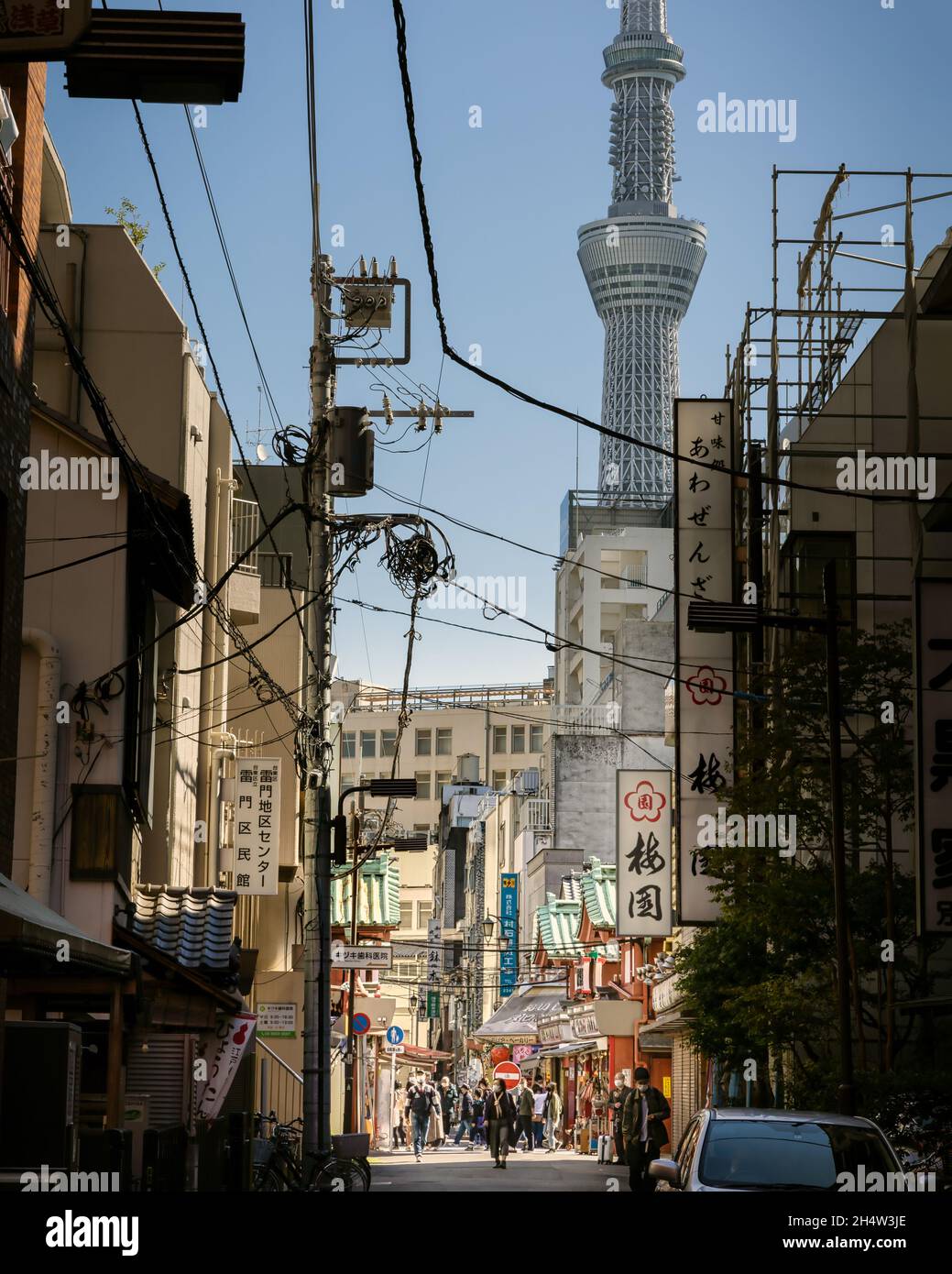 A view down a street in the Asakusa area with the SkyTree in the ...