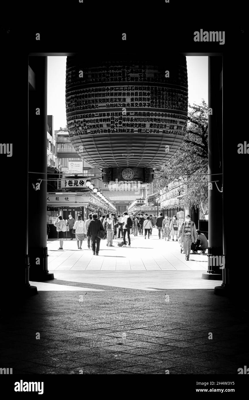 The view down the street through a traditional gate at the Nakamise ...