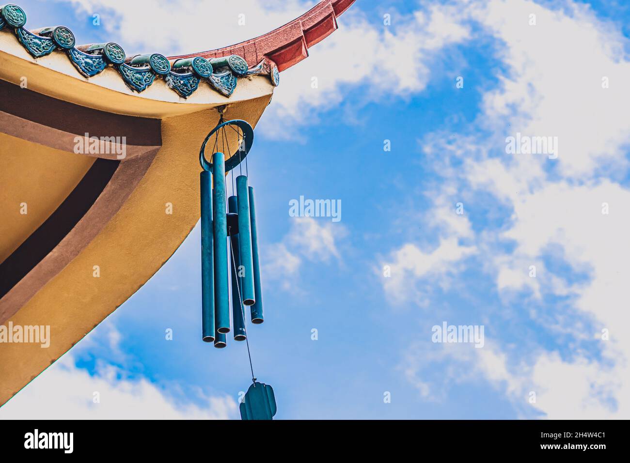 E Pagoda curved roof building temple, metal big hanging wind sound bell ...