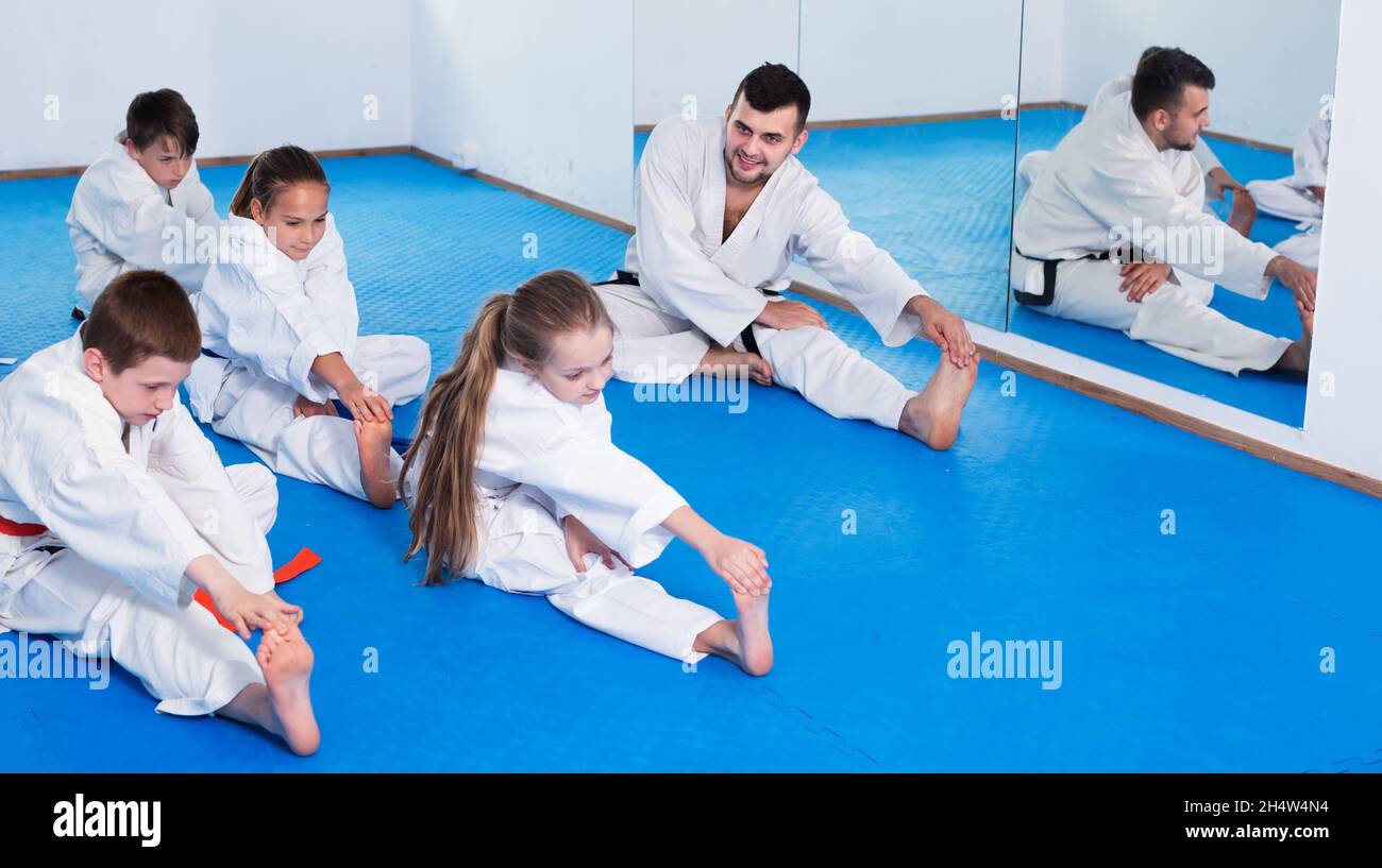 Children stretching hi-res stock photography and images - Alamy