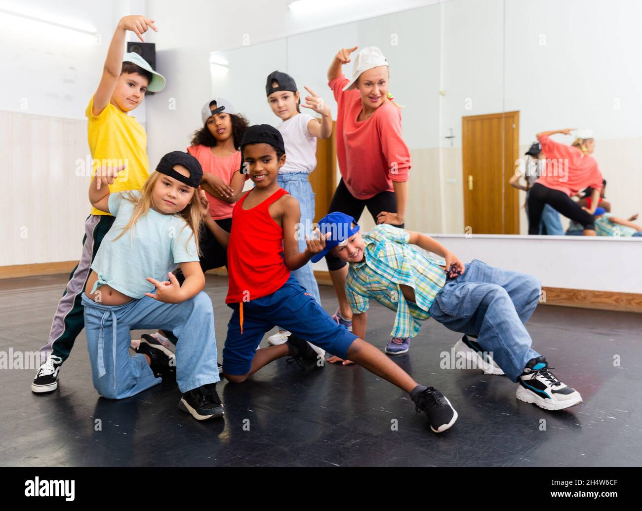 Kids hip hop dancers posing in studio Stock Photo - Alamy