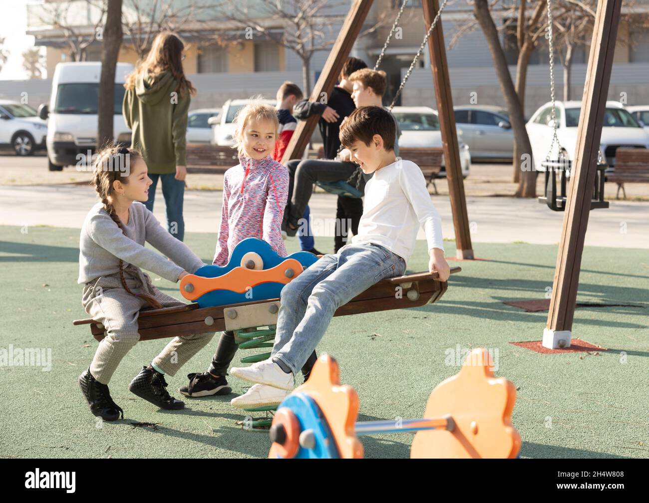 Children playing on playground Stock Photo - Alamy