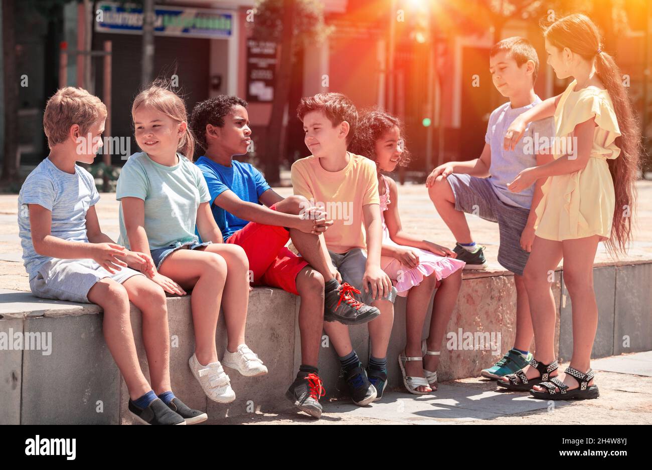 Portrait of children during conversation outdoors Stock Photo - Alamy