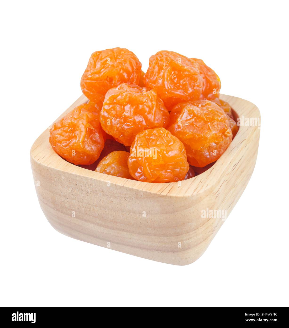 Dried prunes fruits (Preserved fruits Chinese plum) in wooden bowl ...