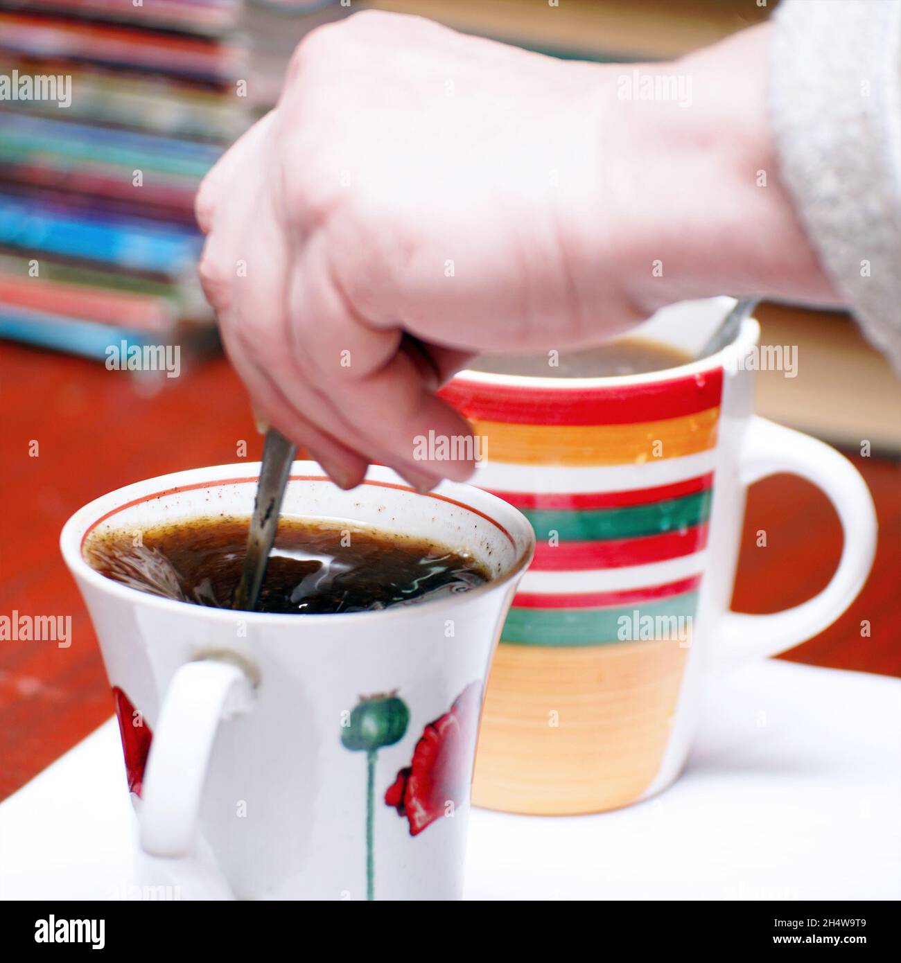 Woman stir sugar in white hi-res stock photography and images - Alamy