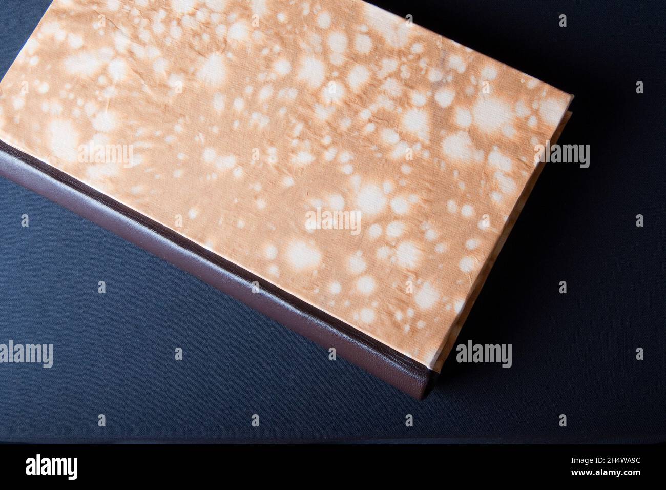 Art of Book binding; handmade book with marble paper front and leather ...