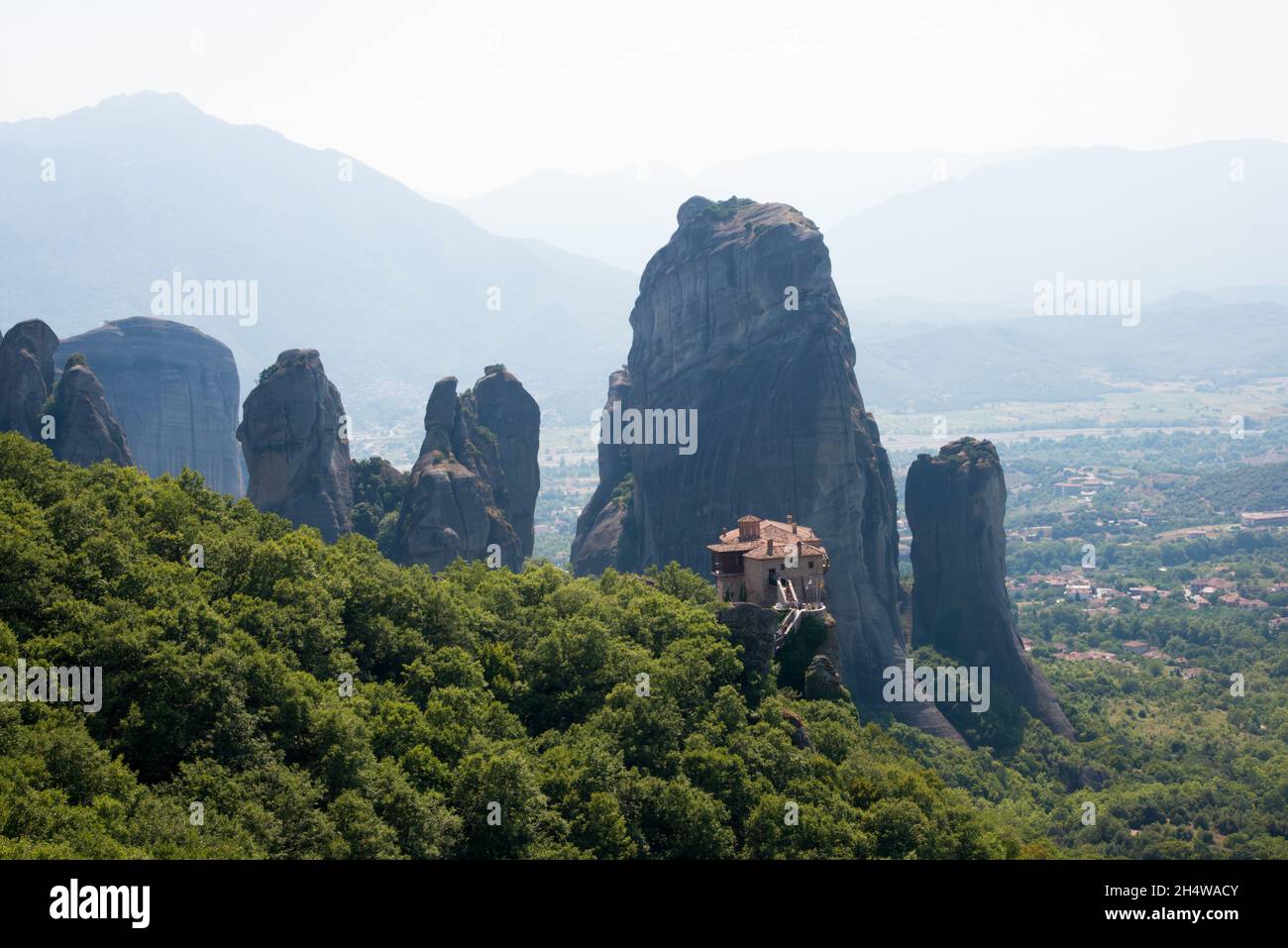Beautiful landscape with Meteora mountains and orthodox monastery ...